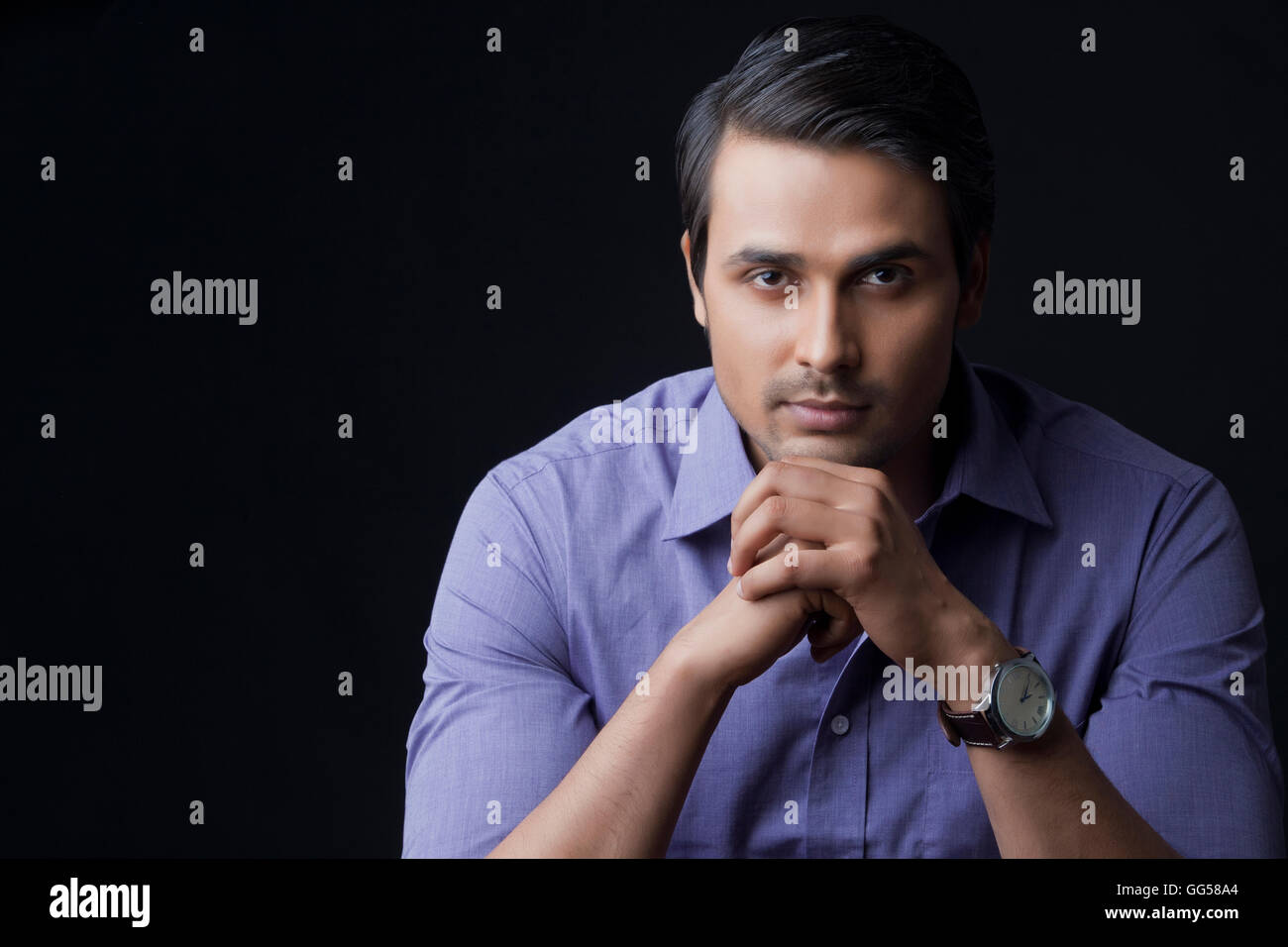 Portrait of confident young businessman isolated over black background ... Portrait of confident young businessman isolated over black background ...