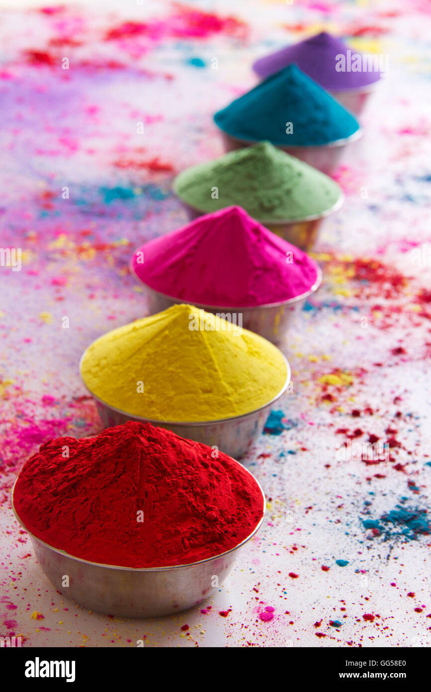 Row of colorful Holi powder in bows over white background Stock Photo ...