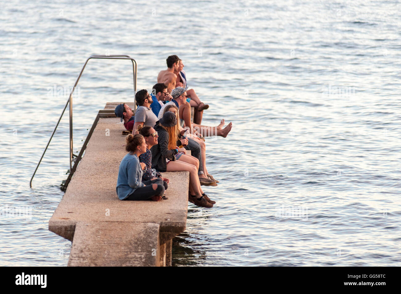 Music festival. People enjoying the music festival on the seaside in ...
