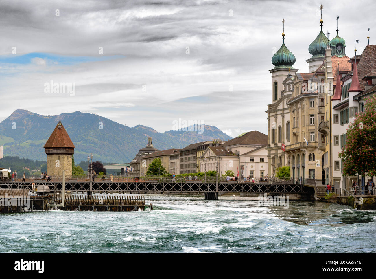 Chapel bridge over the Reuss river in Luzern, Switzerland Stock Photo ...
