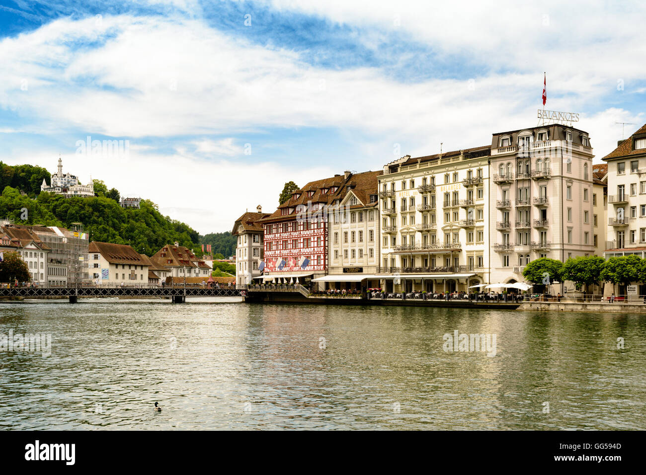 Typical Swiss buildings on the shore of river Reuss in Luzern ...