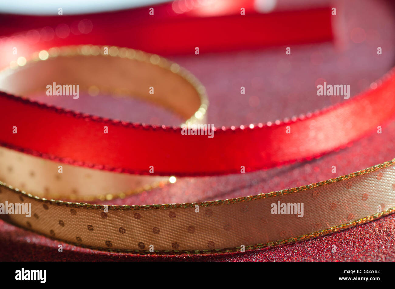closeup to decorative golden and red ribbon Stock Photo - Alamy