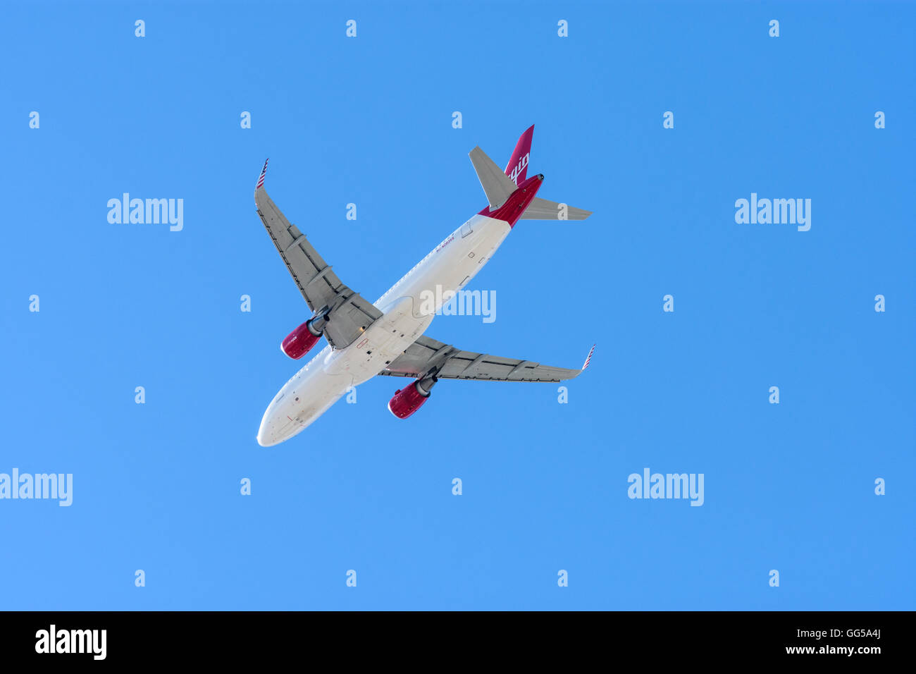 Looking up to a Virgin America Airbus A320 plane flying overhead Stock ...