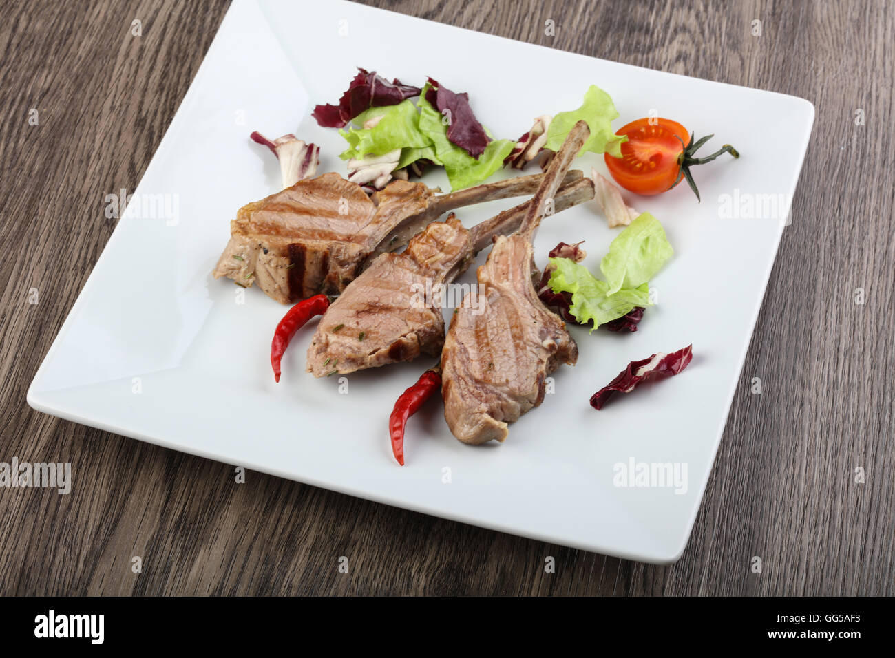Lamb Frenched Rack grilled rib bone Stock Photo - Alamy