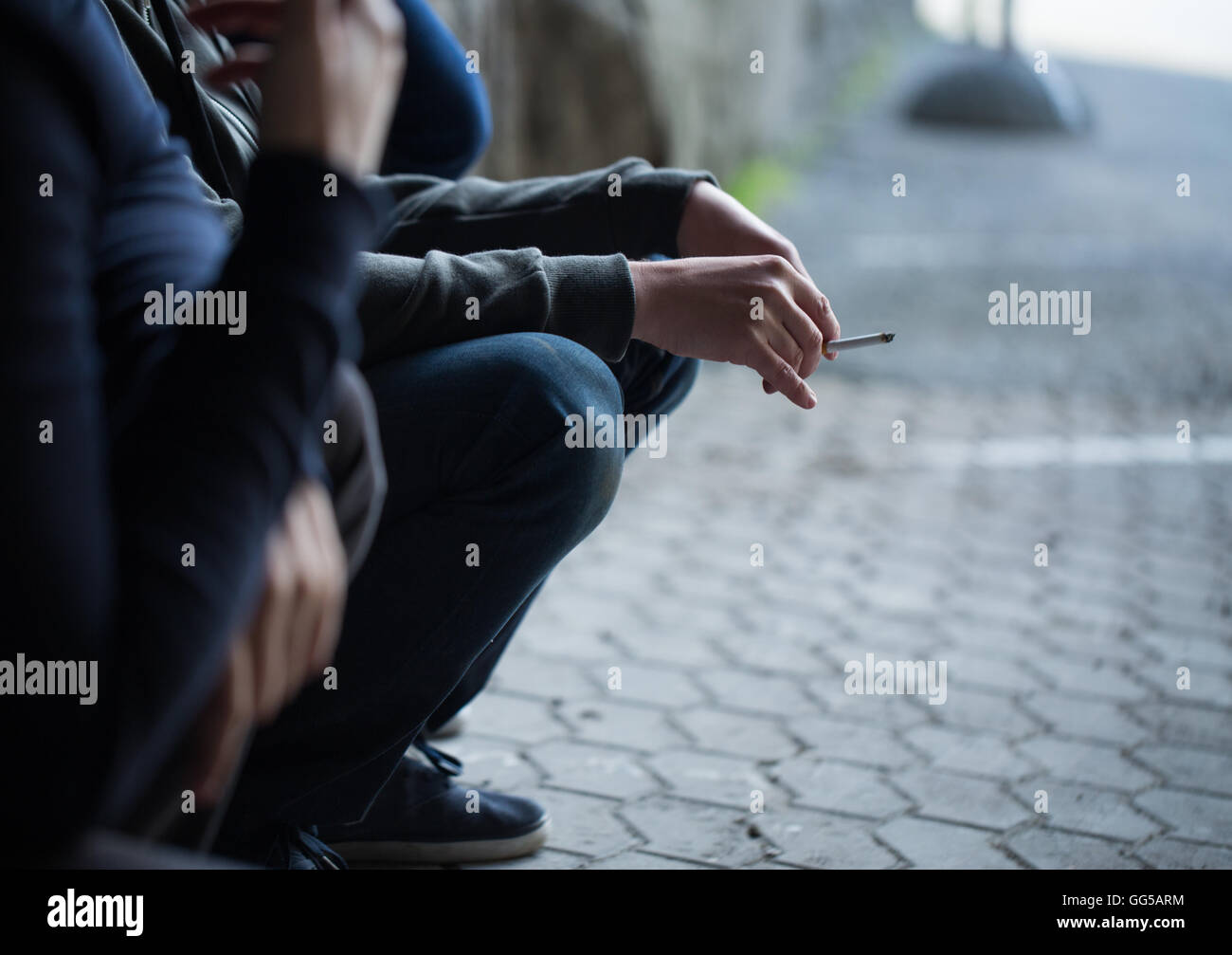 Men smoking cigarettes hi-res stock photography and images - Alamy
