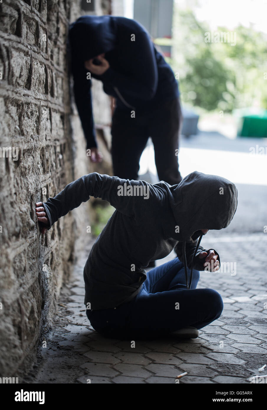 Drug use sitting drug intoxication hi-res stock photography and images ...