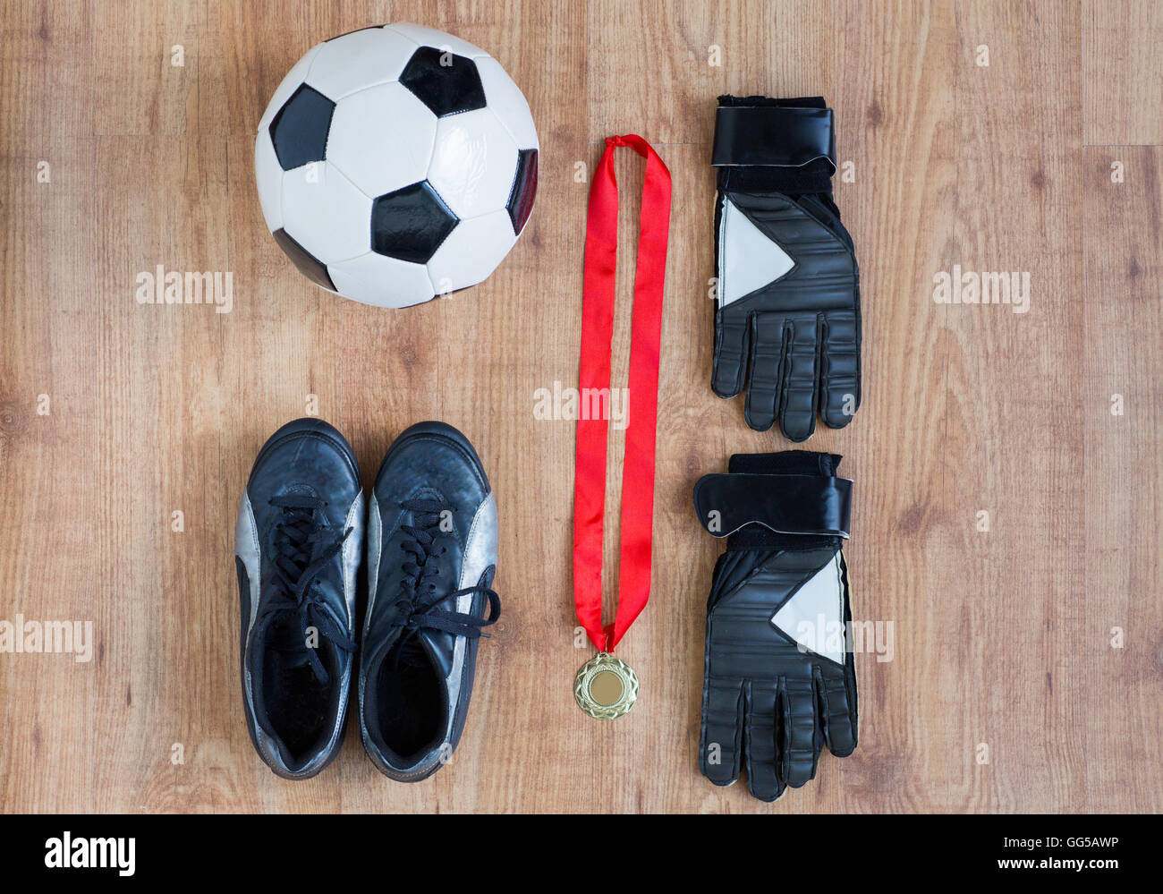 close up of soccer ball, boots, gloves and medal Stock Photo - Alamy