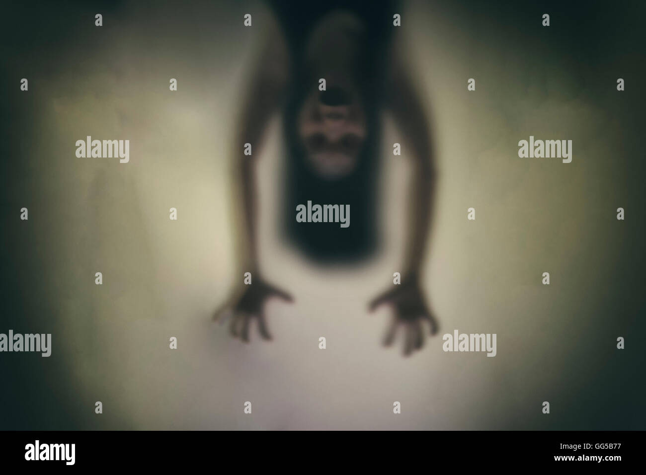 Devil woman hanging upside down, pretending to haunt. Concept blur With ...