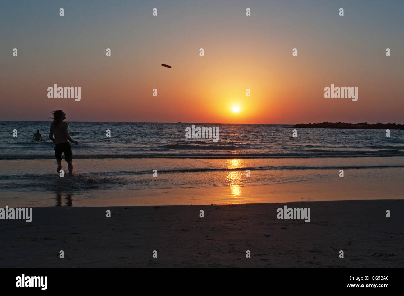 Boy playing with a frisbee hi-res stock photography and images - Alamy
