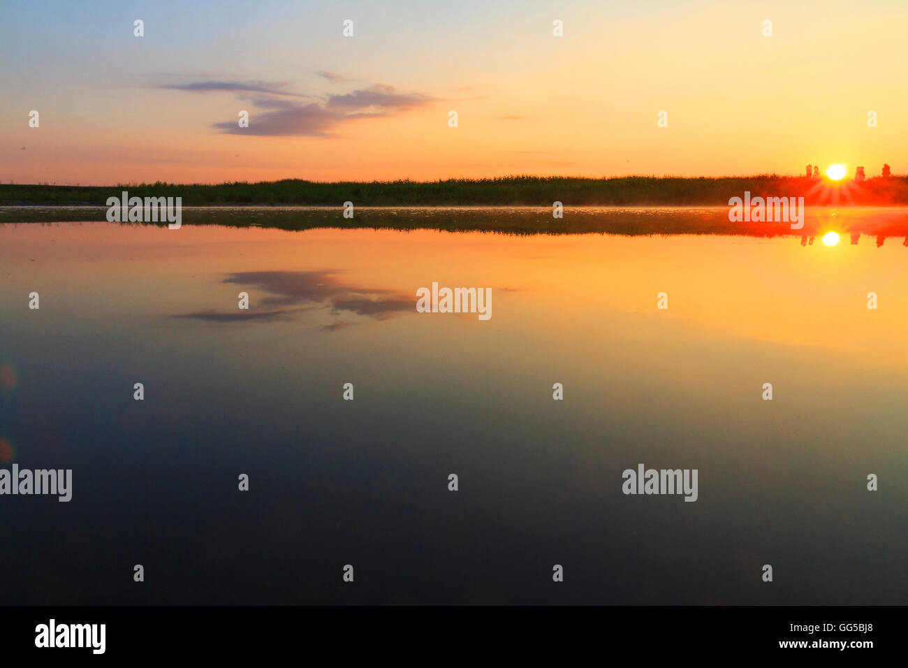 beautiful sunrise over the lake Stock Photo - Alamy