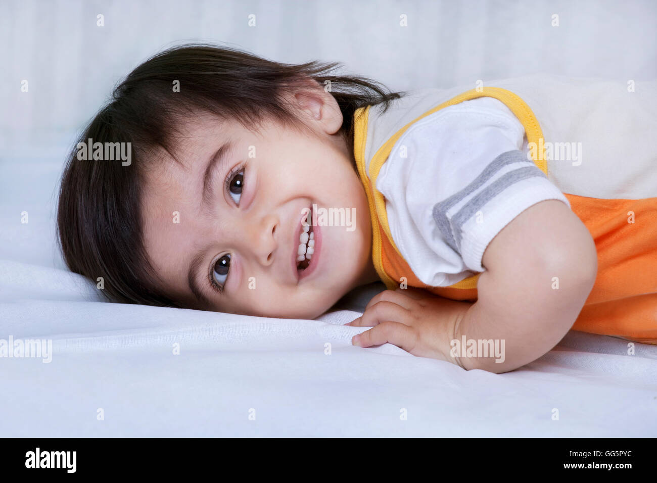 Portrait of a little boy smiling Stock Photo - Alamy