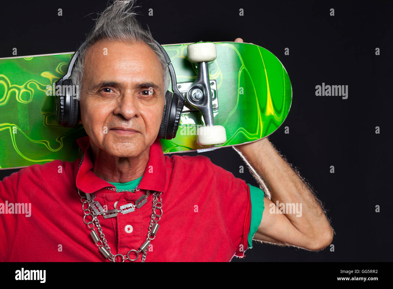 Close-up portrait of old man with skateboard Stock Photo - Alamy