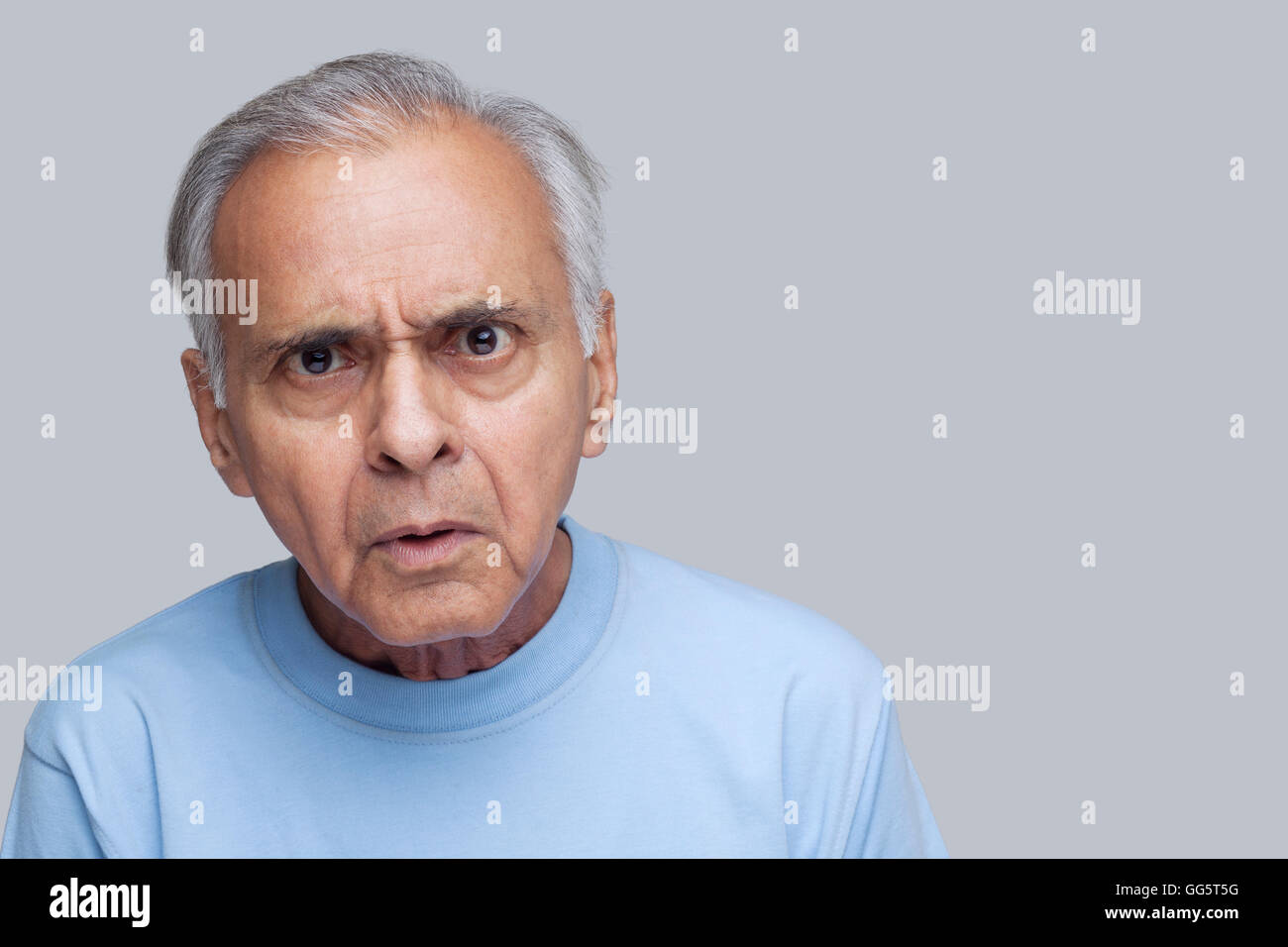 Portrait of an elderly angry man Stock Photo - Alamy