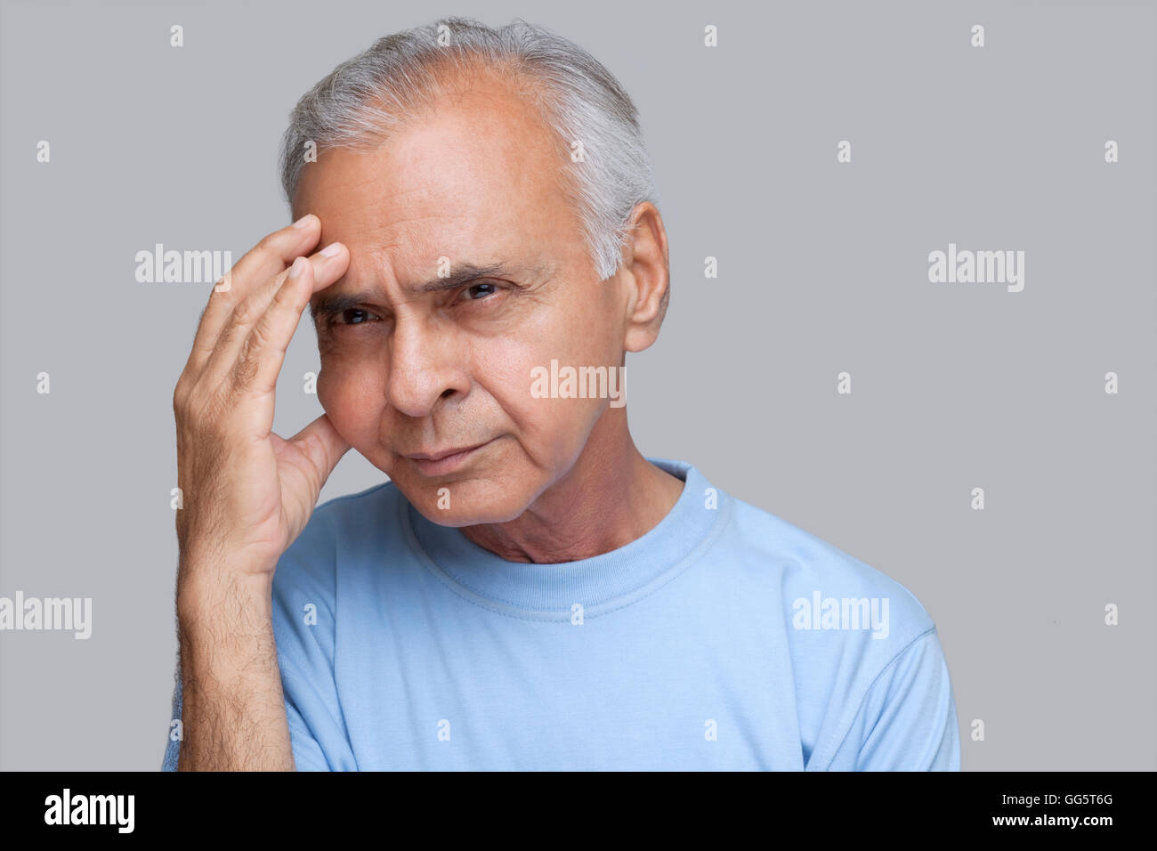 Close-up of tensed senior man Stock Photo - Alamy