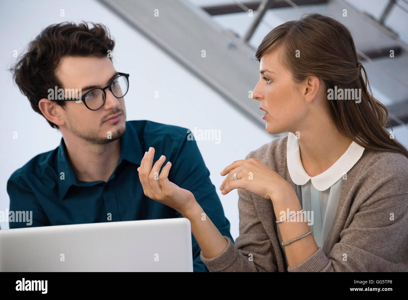 Two executives discussing hi-res stock photography and images - Alamy