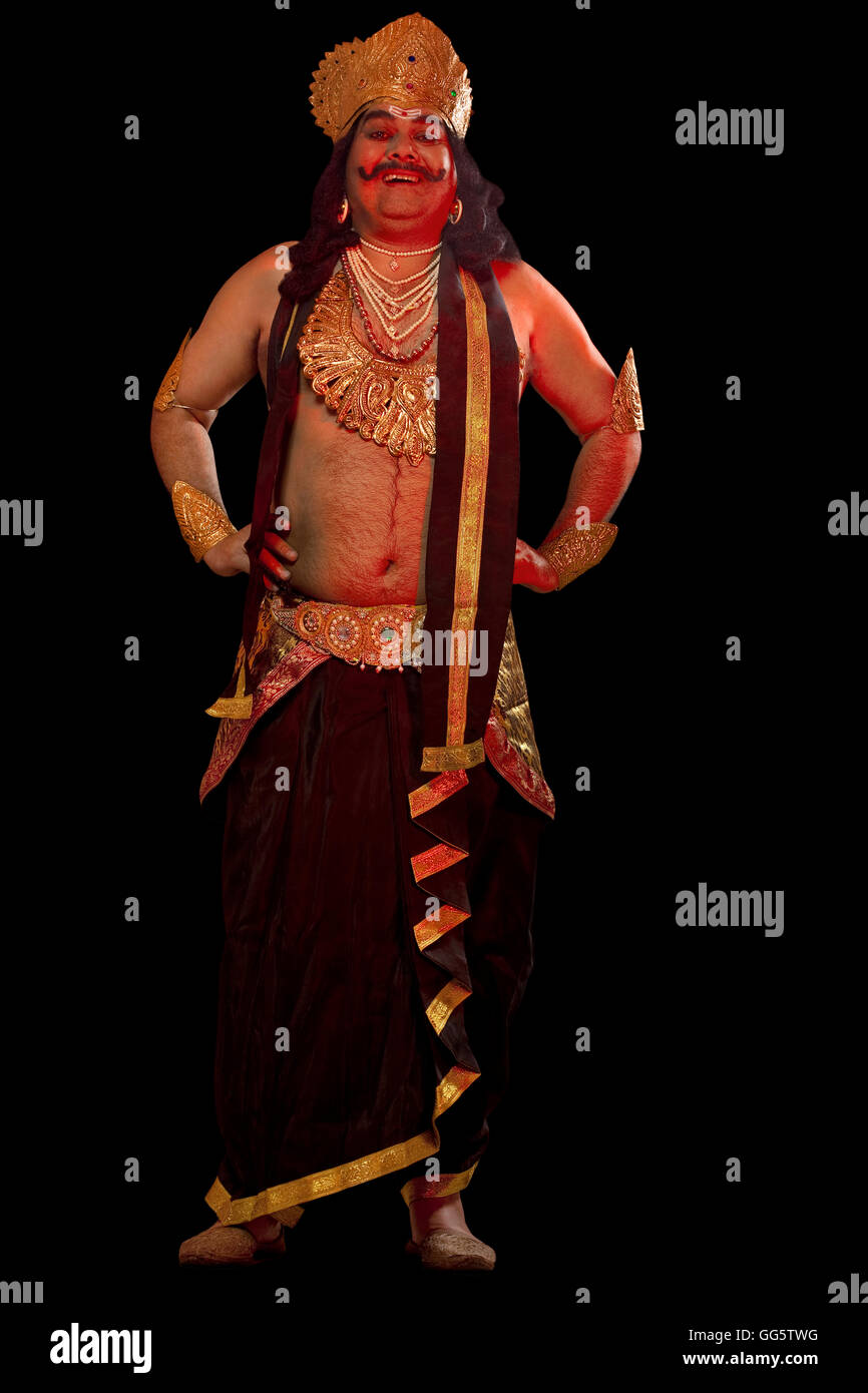 Portrait of a man dressed as Raavan smiling Stock Photo - Alamy
