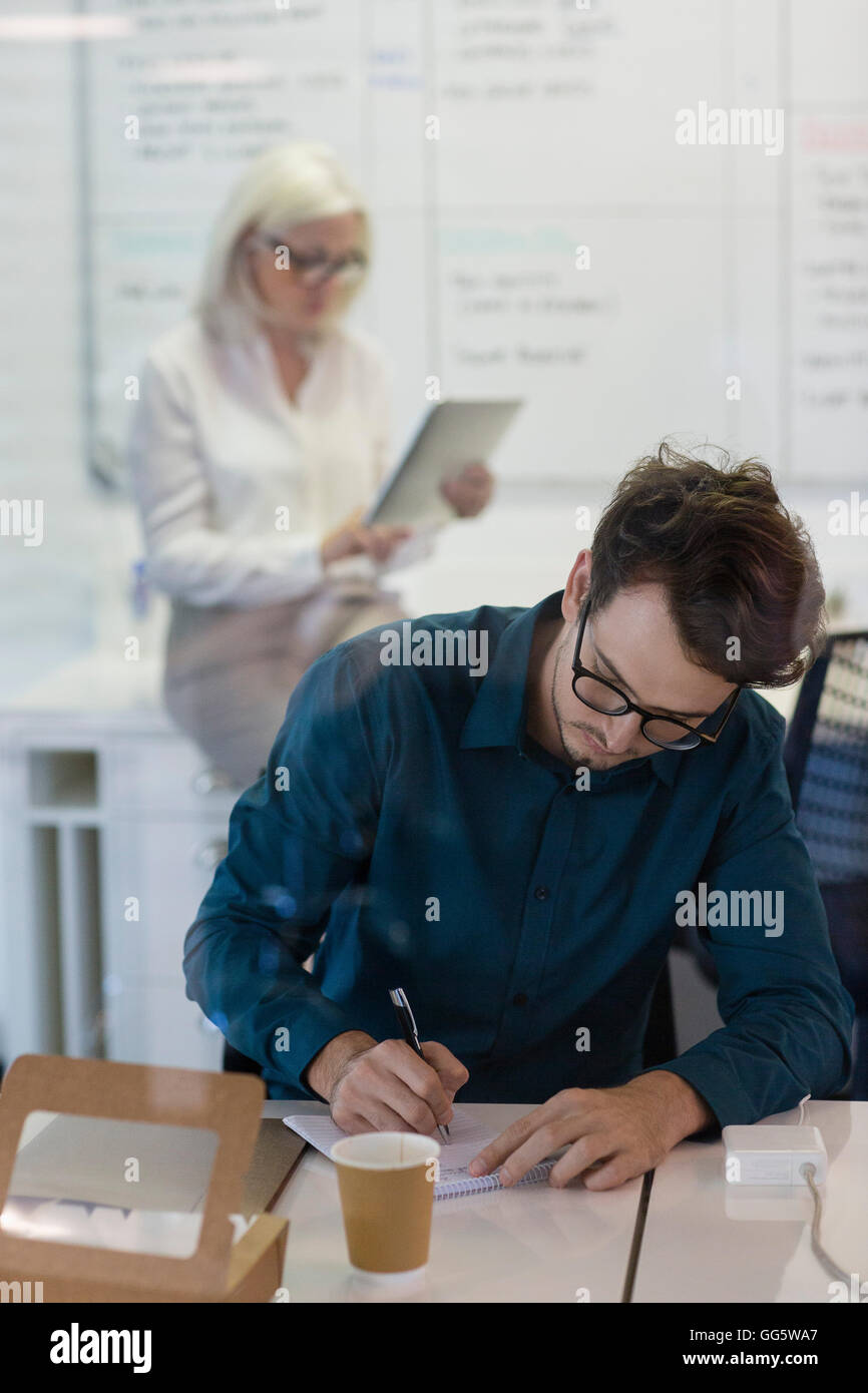 Coworker paperwork hi-res stock photography and images - Alamy