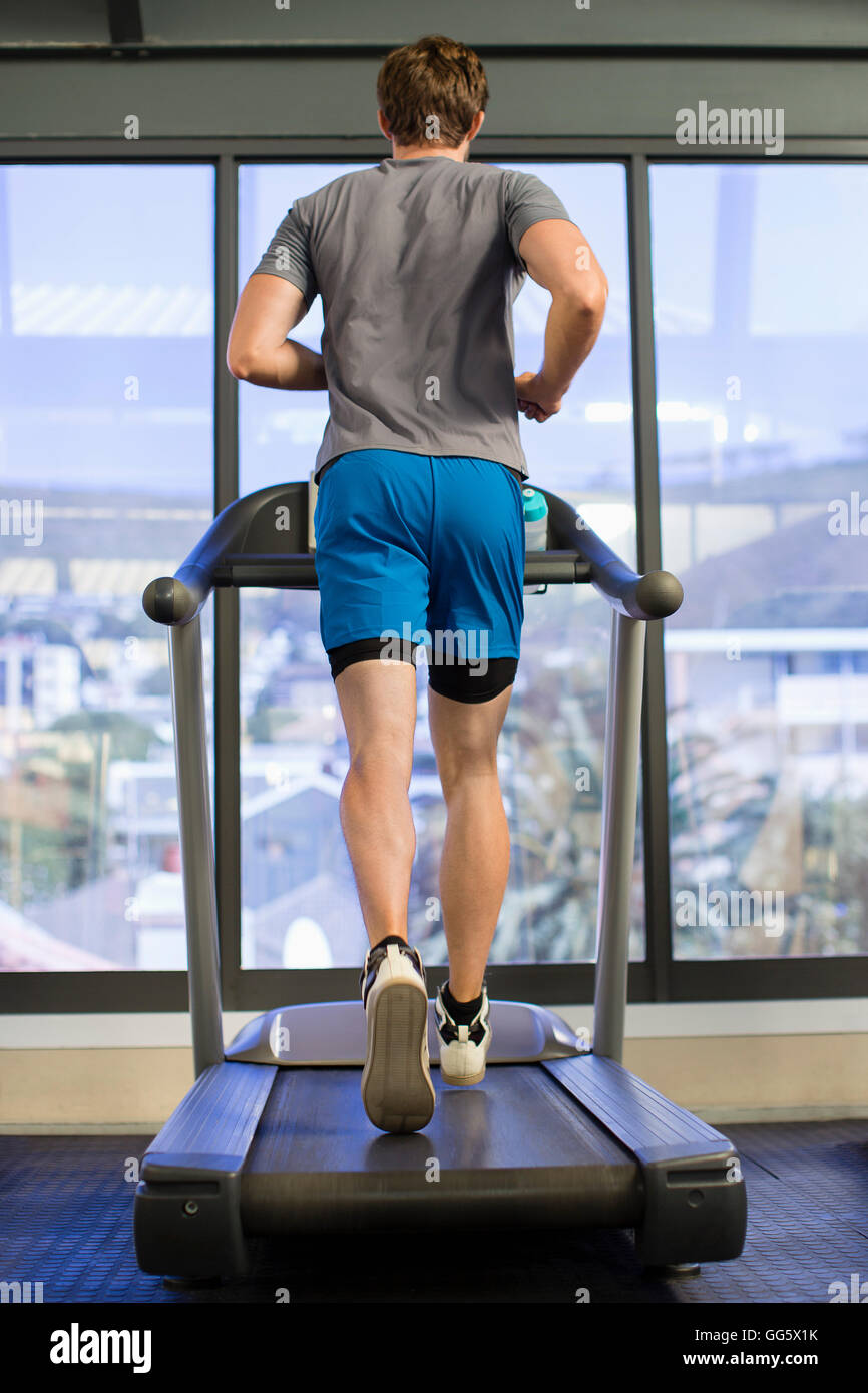 Person on running machine hi-res stock photography and images - Alamy