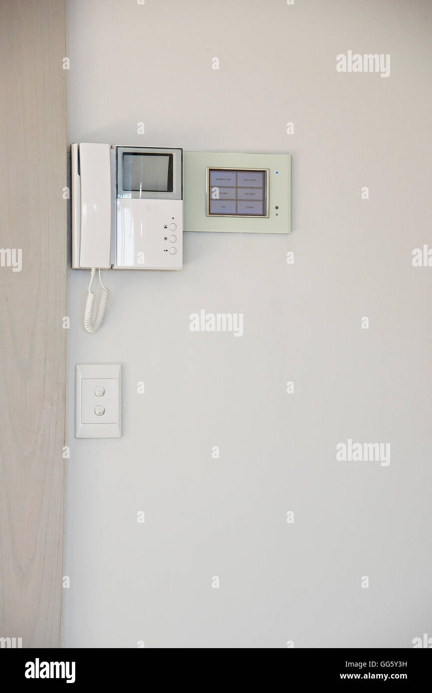 Intercom on wall at building entrance Stock Photo - Alamy