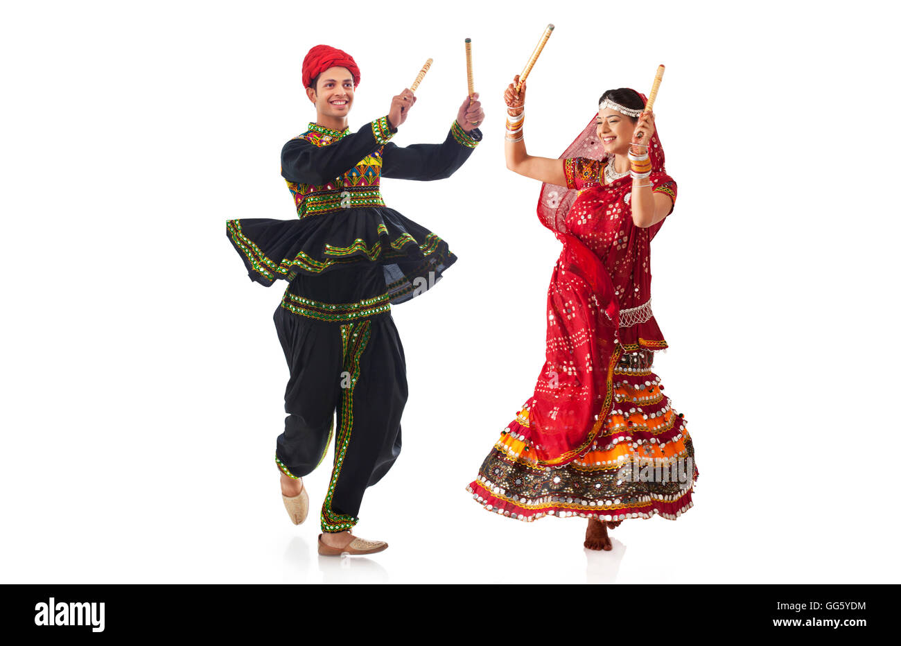 Couple performing dandia dance Stock Photo - Alamy