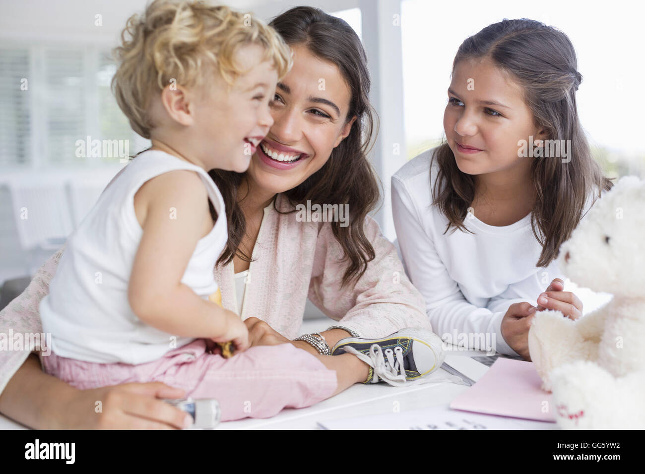 Mother and children playing hi-res stock photography and images - Alamy