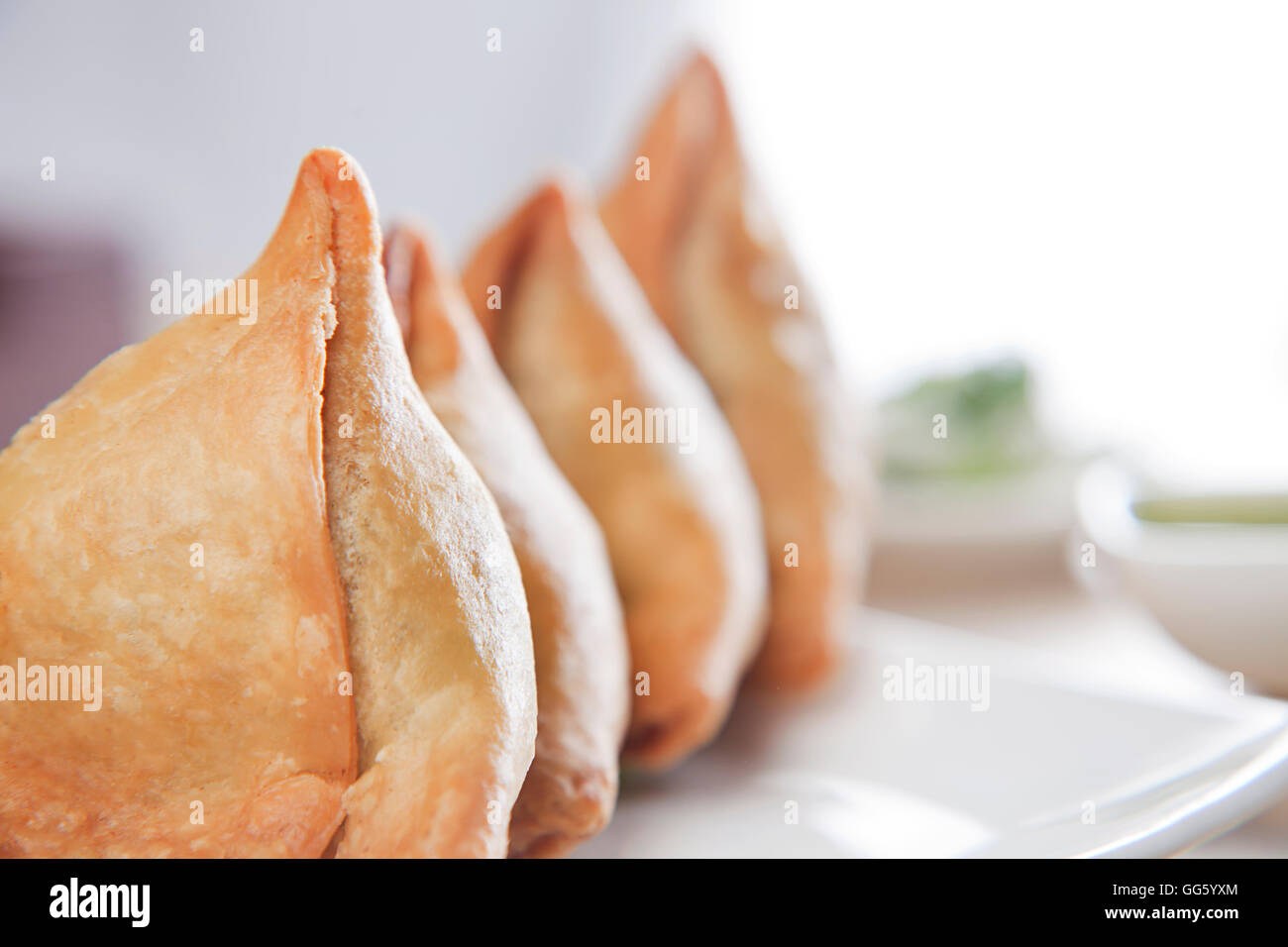 Samosa in plate hi-res stock photography and images - Alamy
