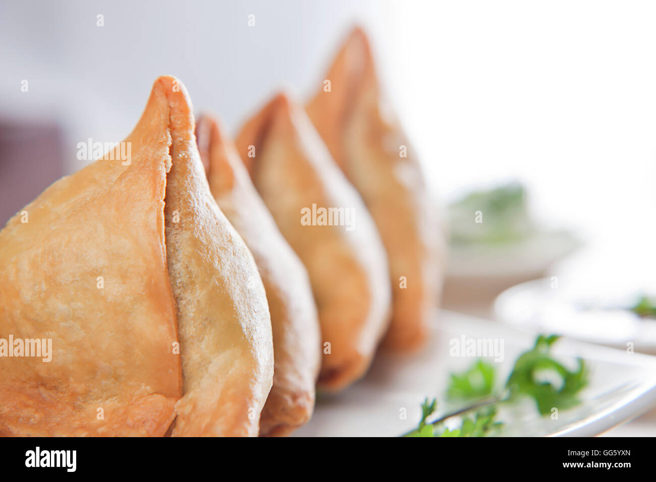 Samosa in plate hi-res stock photography and images - Alamy