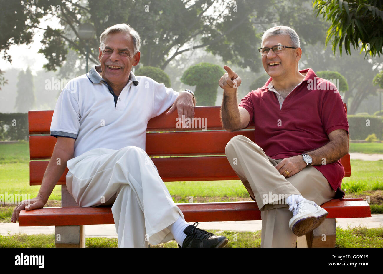 Old man pointing something out to his friend Stock Photo - Alamy