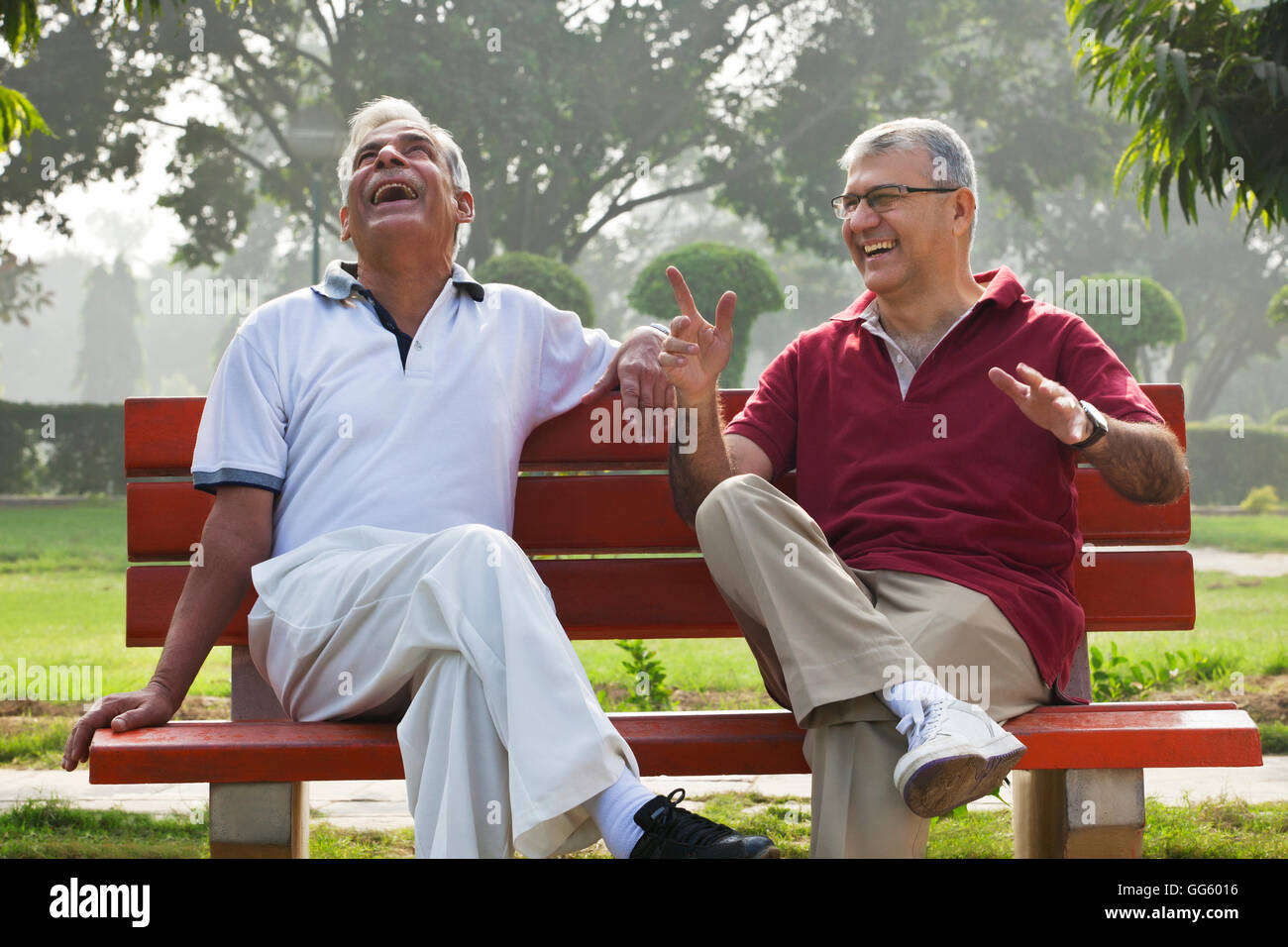 Old men sharing a laugh Stock Photo - Alamy