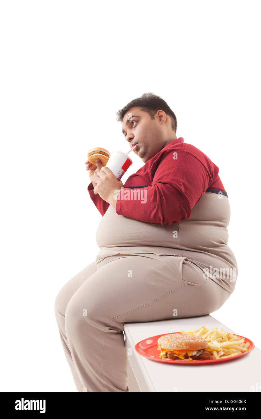 Overweight Man Eating