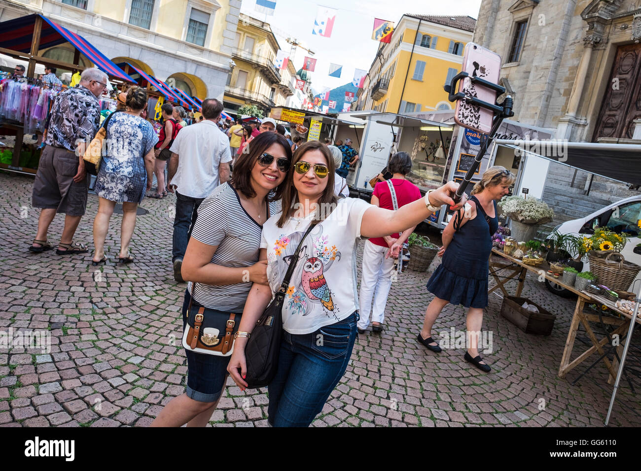 Switzerland, Canton Ticino, Bellinzona, saturday market, selfie Stock ...
