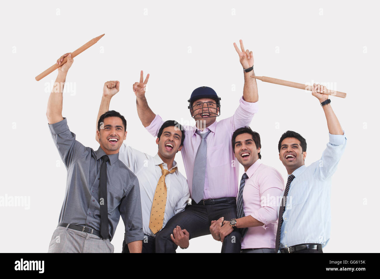 Executives cheering during cricket match Stock Photo - Alamy