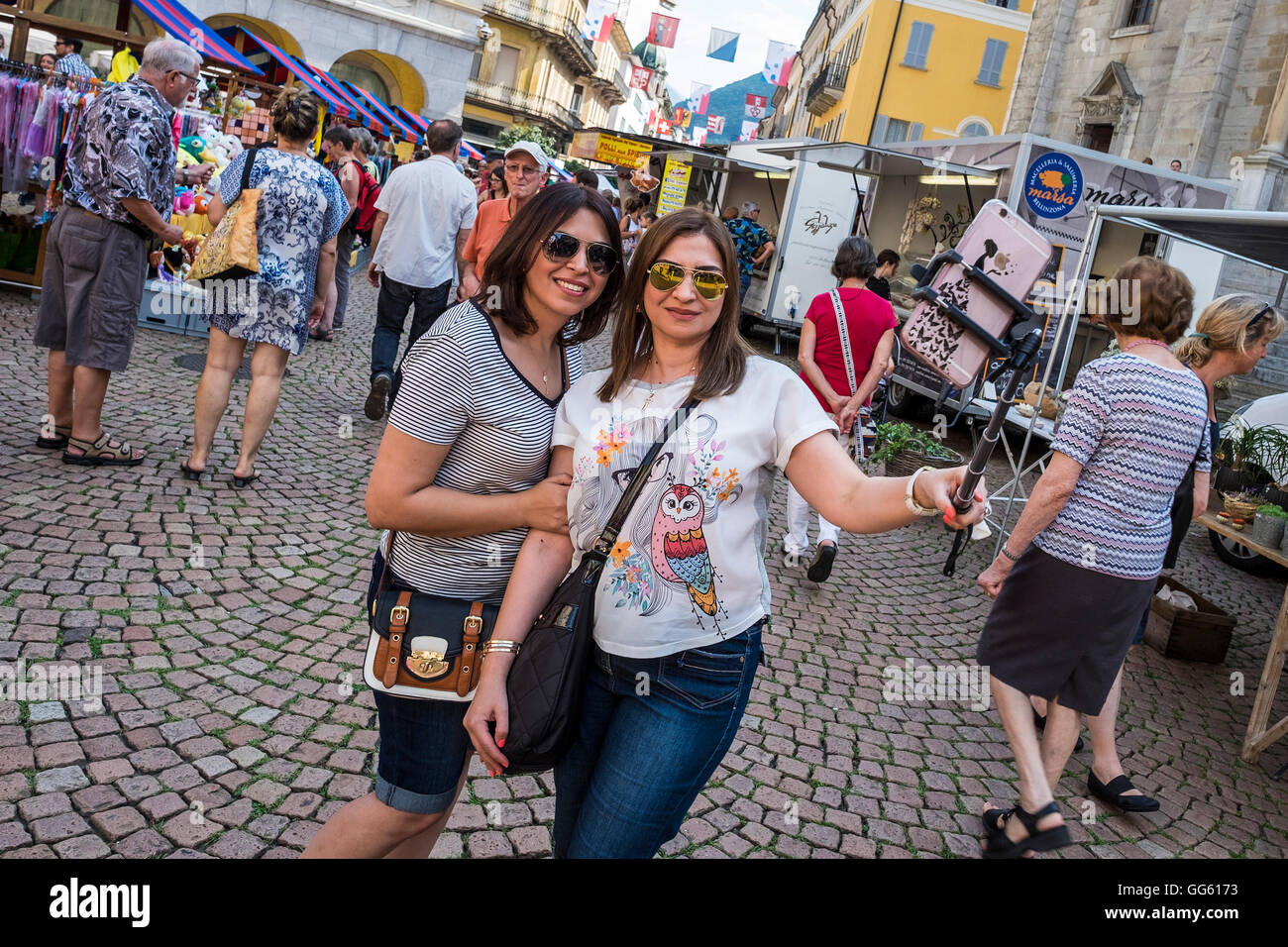 Switzerland, Canton Ticino, Bellinzona, saturday market, selfie Stock ...