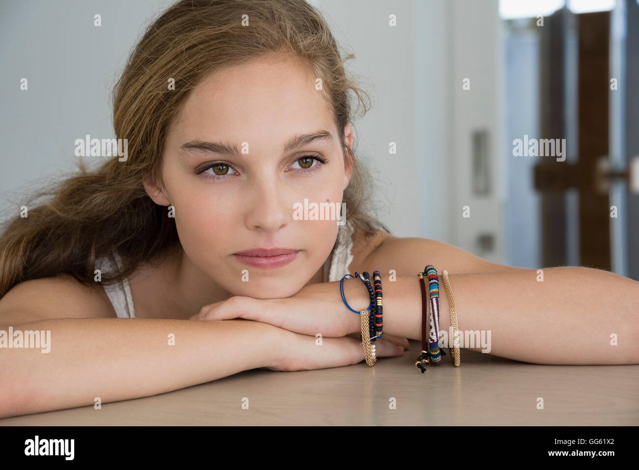 Close-up of beautiful teenage girl thinking Stock Photo - Alamy