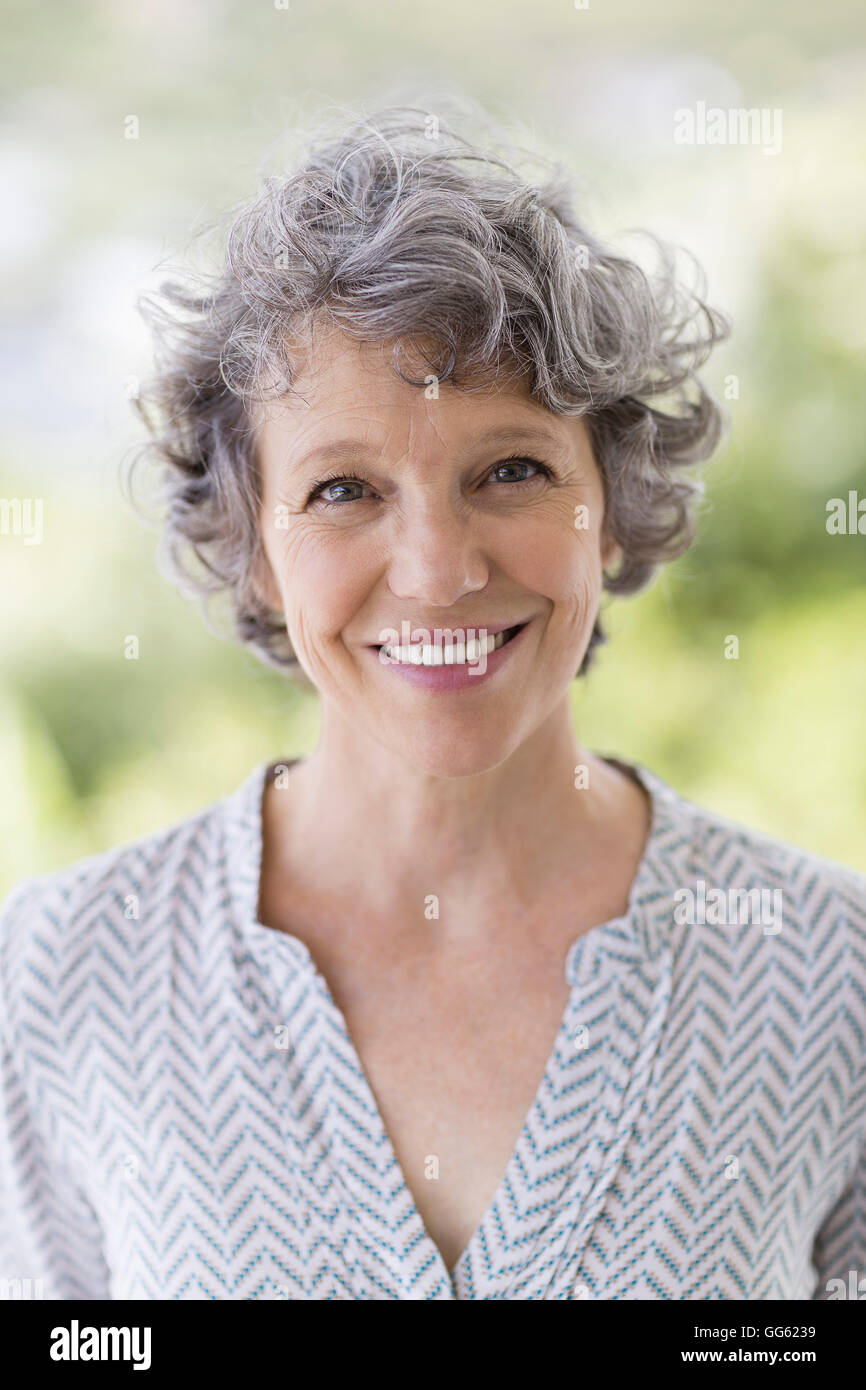 Portrait of a woman smiling Stock Photo - Alamy