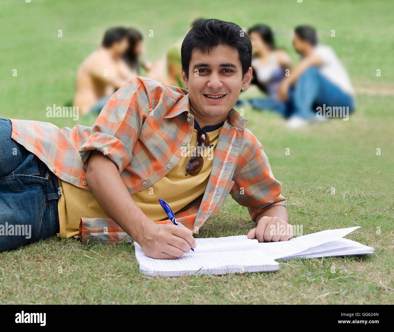 College student taking notes Stock Photo - Alamy
