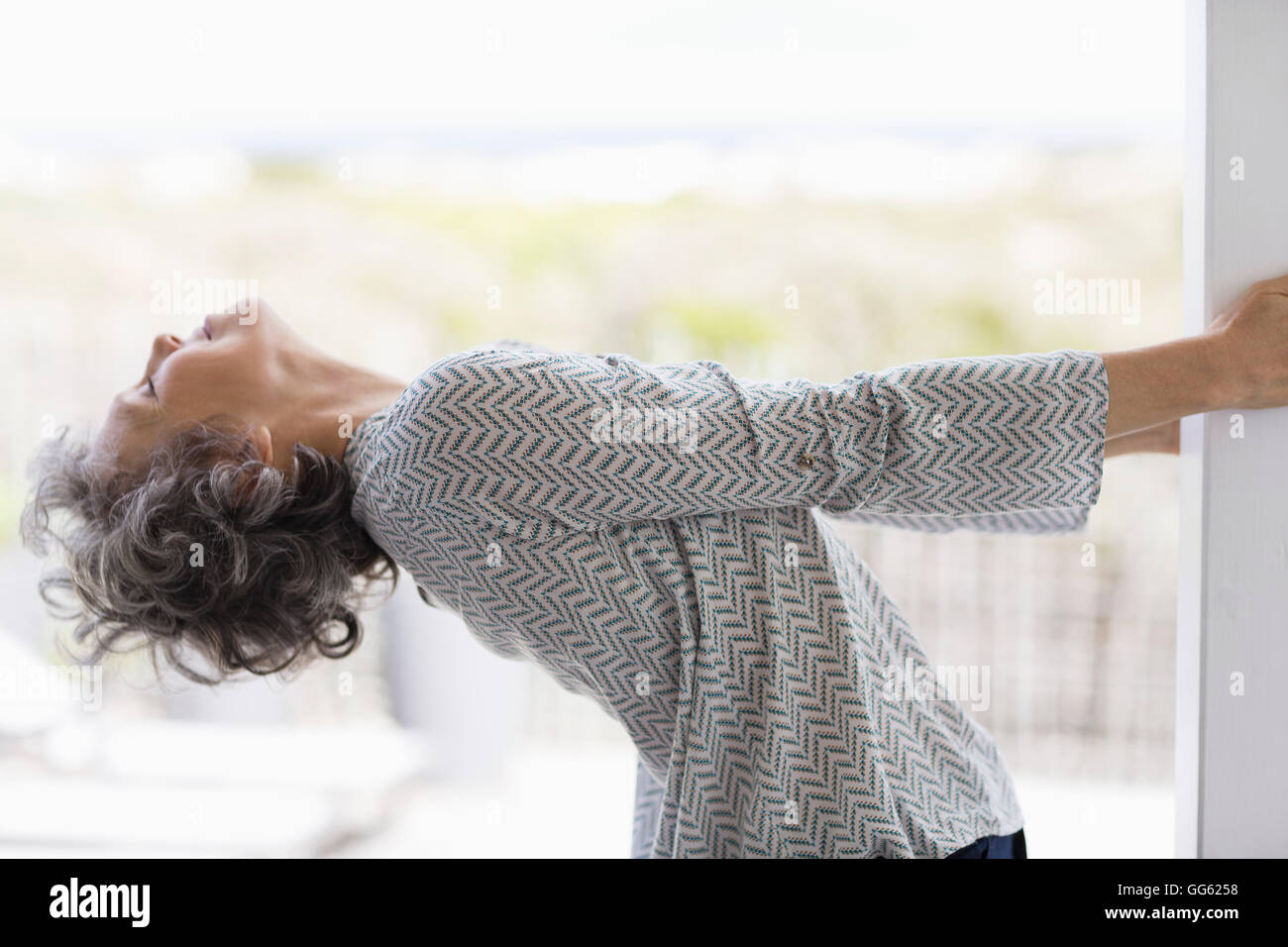 Side profile woman bending hi-res stock photography and images - Alamy