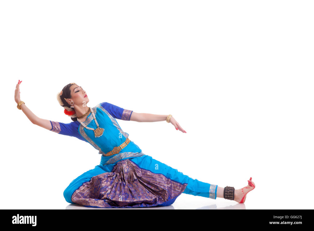 Beautiful Bharat Natyam dancer performing over white background Stock ...