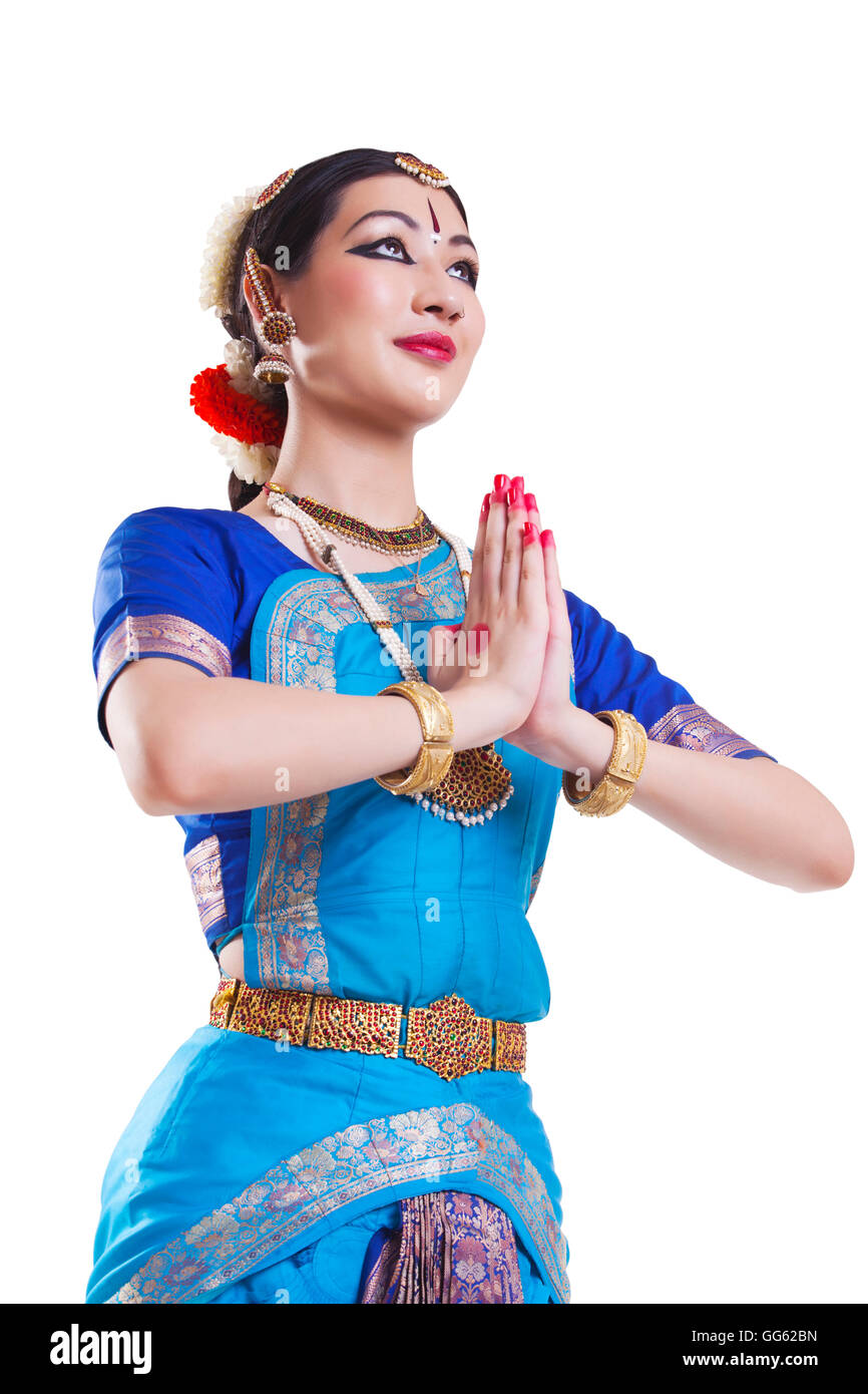 Bharatanatyam dancer in prayer position against white background Stock ...