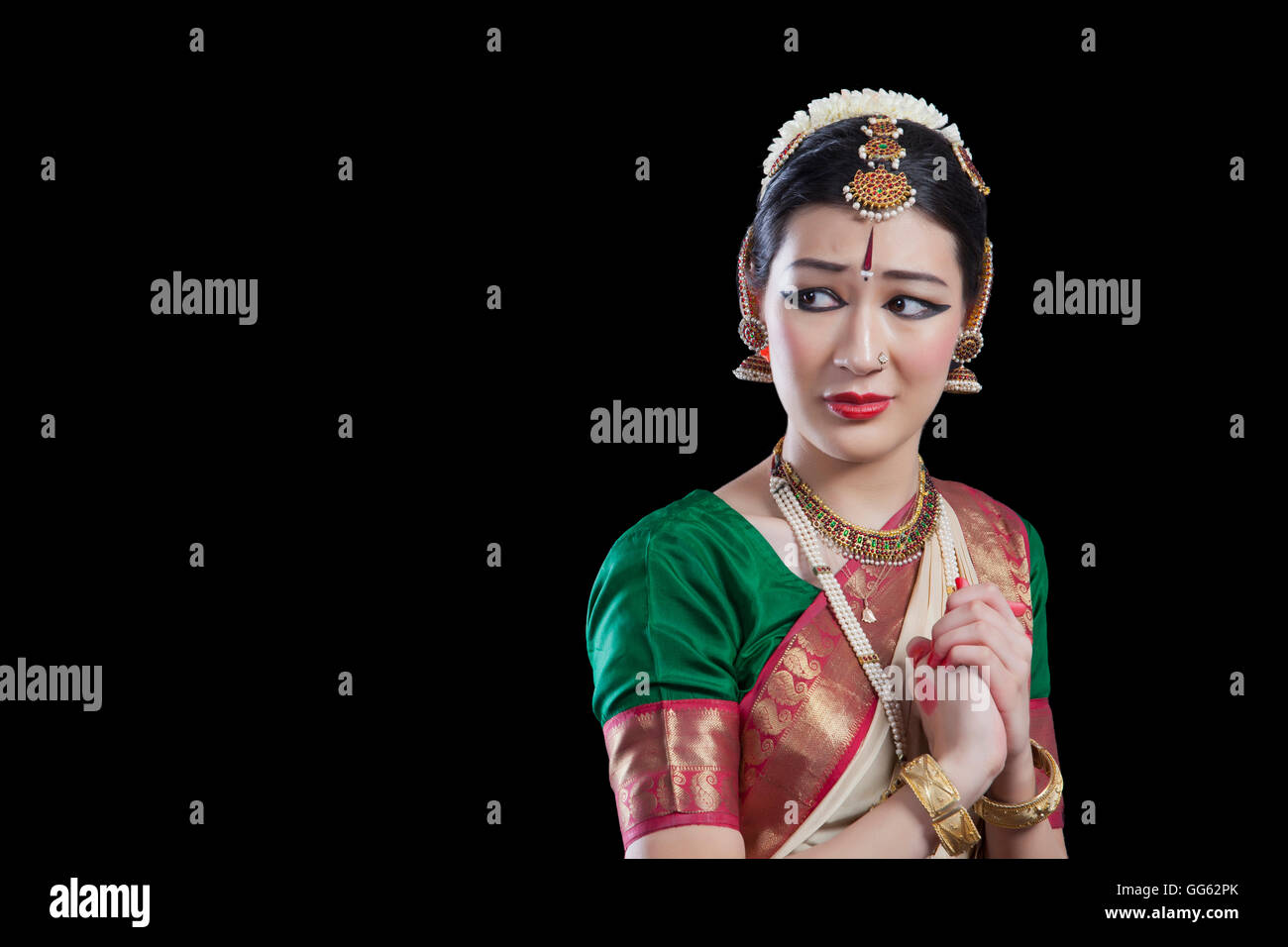 Sad dancer performing Bharatanatyam over black background Stock Photo ...