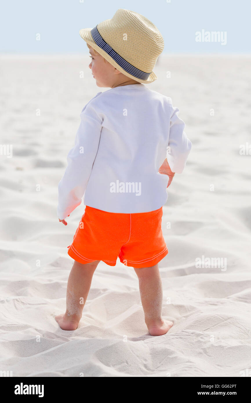 One small boy standing hi-res stock photography and images - Alamy