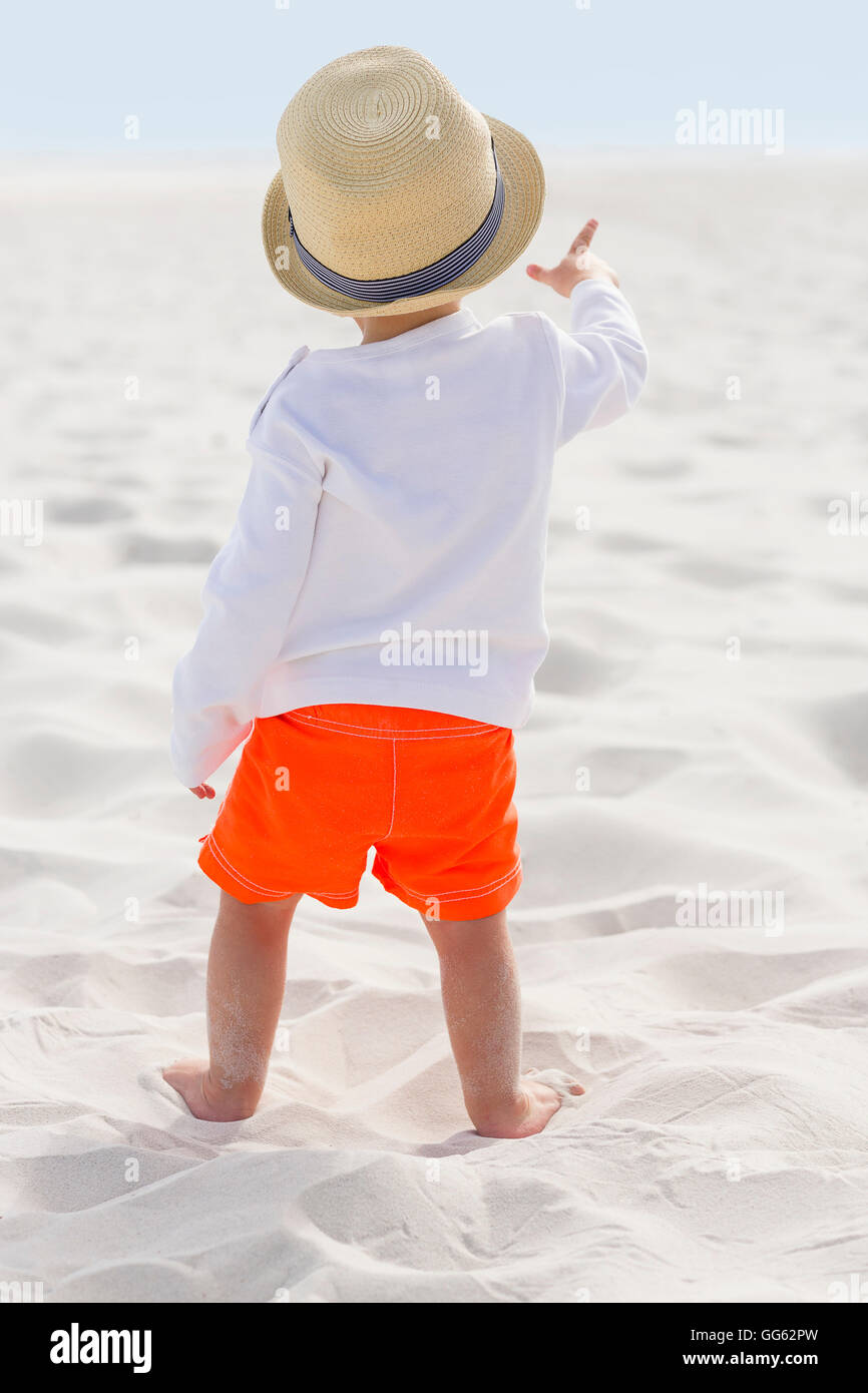 Barefoot boy standing hi-res stock photography and images - Alamy