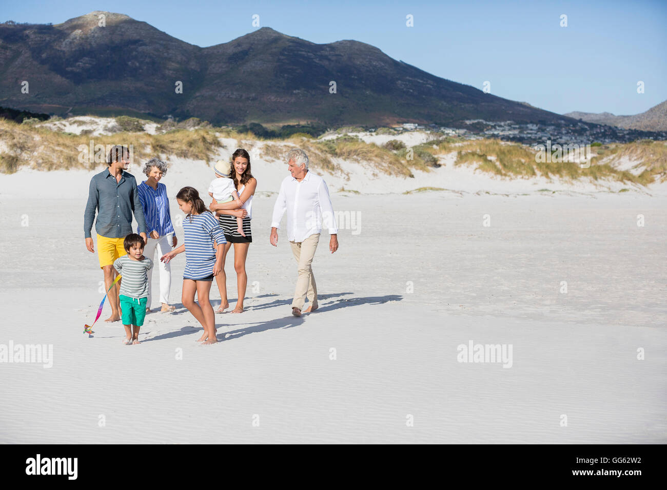 Family beach walking happy hi-res stock photography and images - Alamy