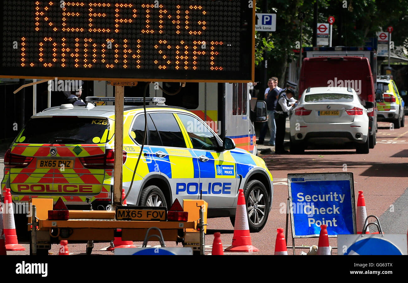 Police impose a vehicle check point during a security operation near ...