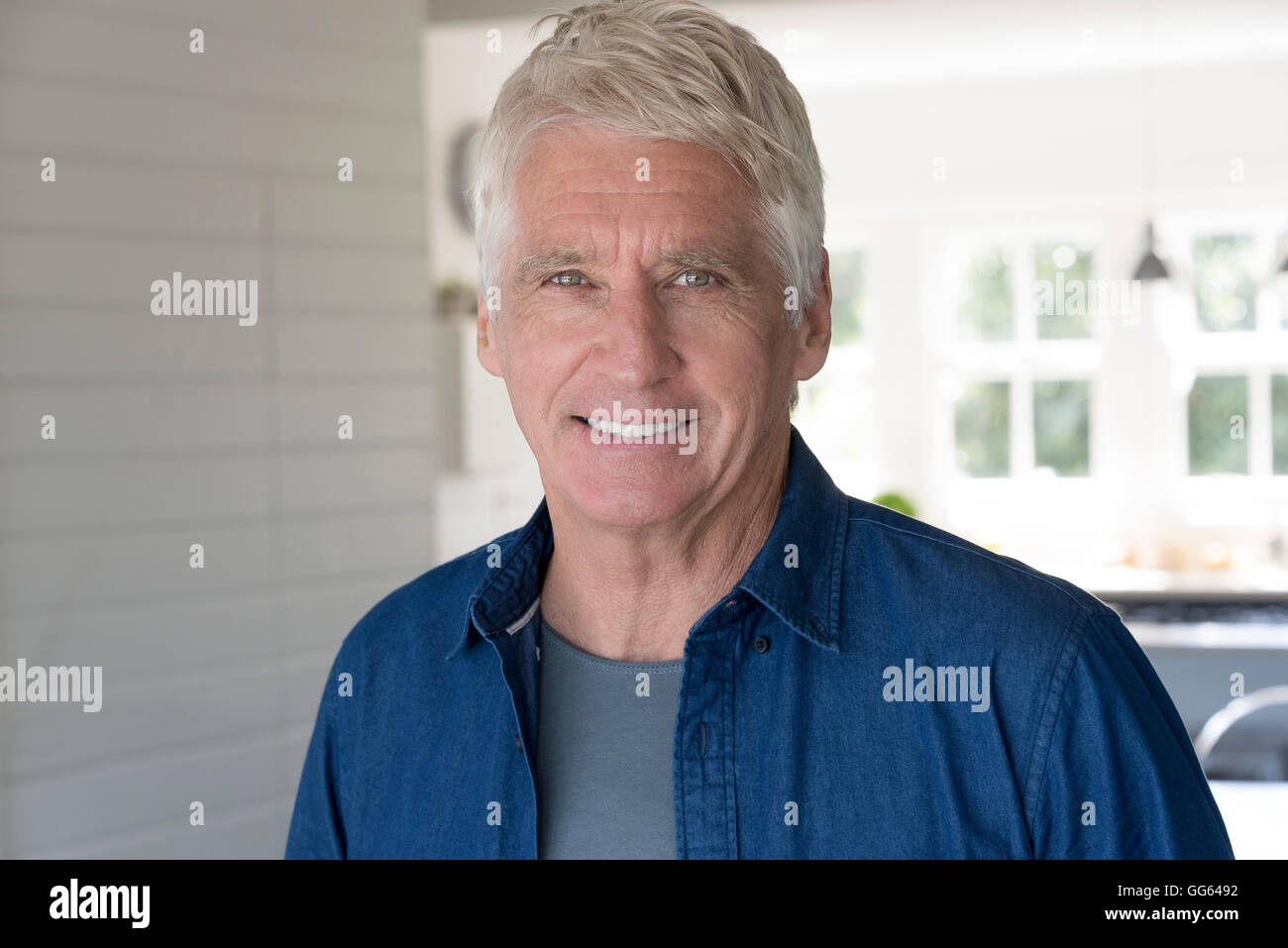 Portrait happy man smiling home hi-res stock photography and images - Alamy