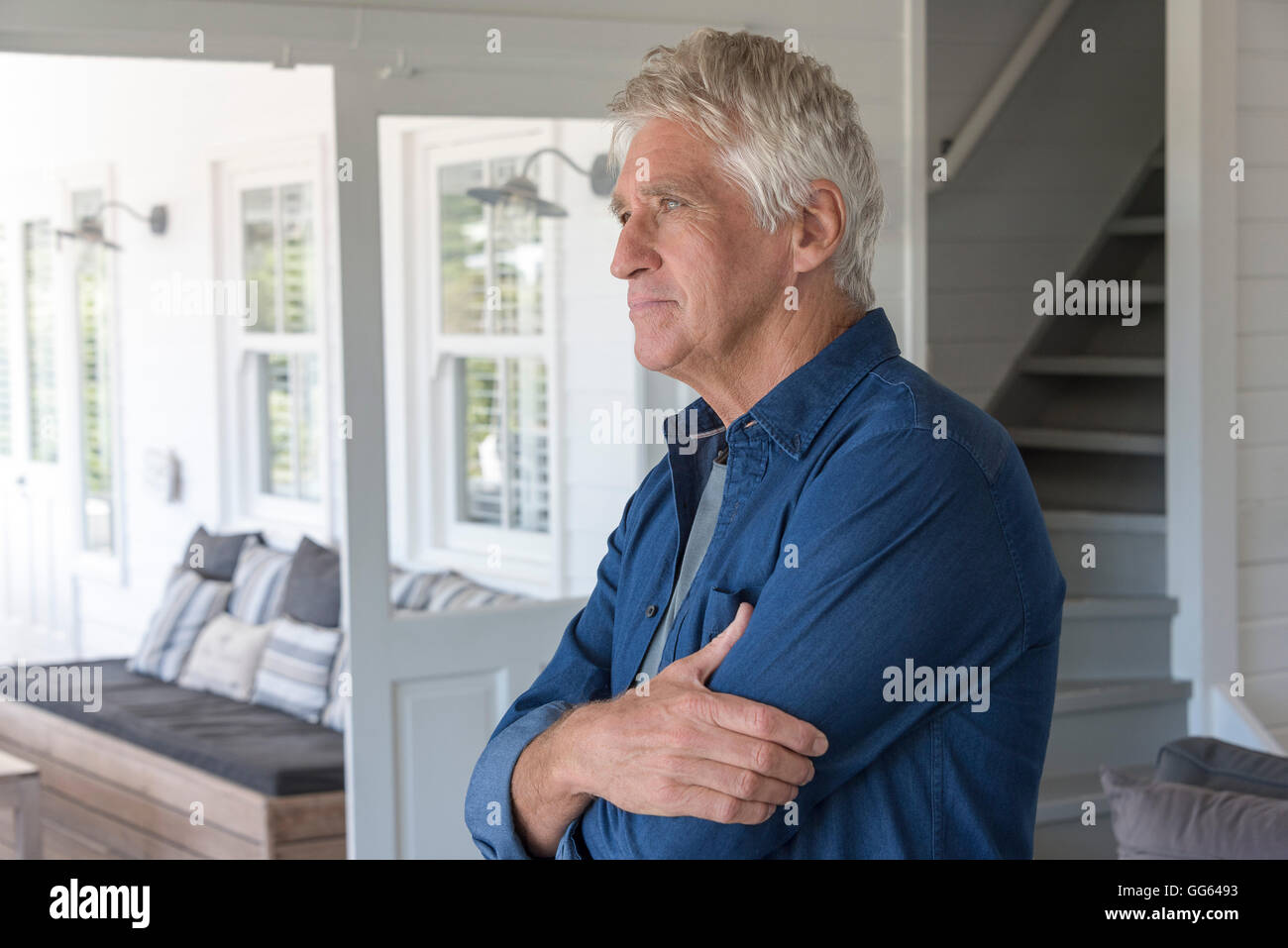 Happy senior man standing on hi-res stock photography and images - Alamy