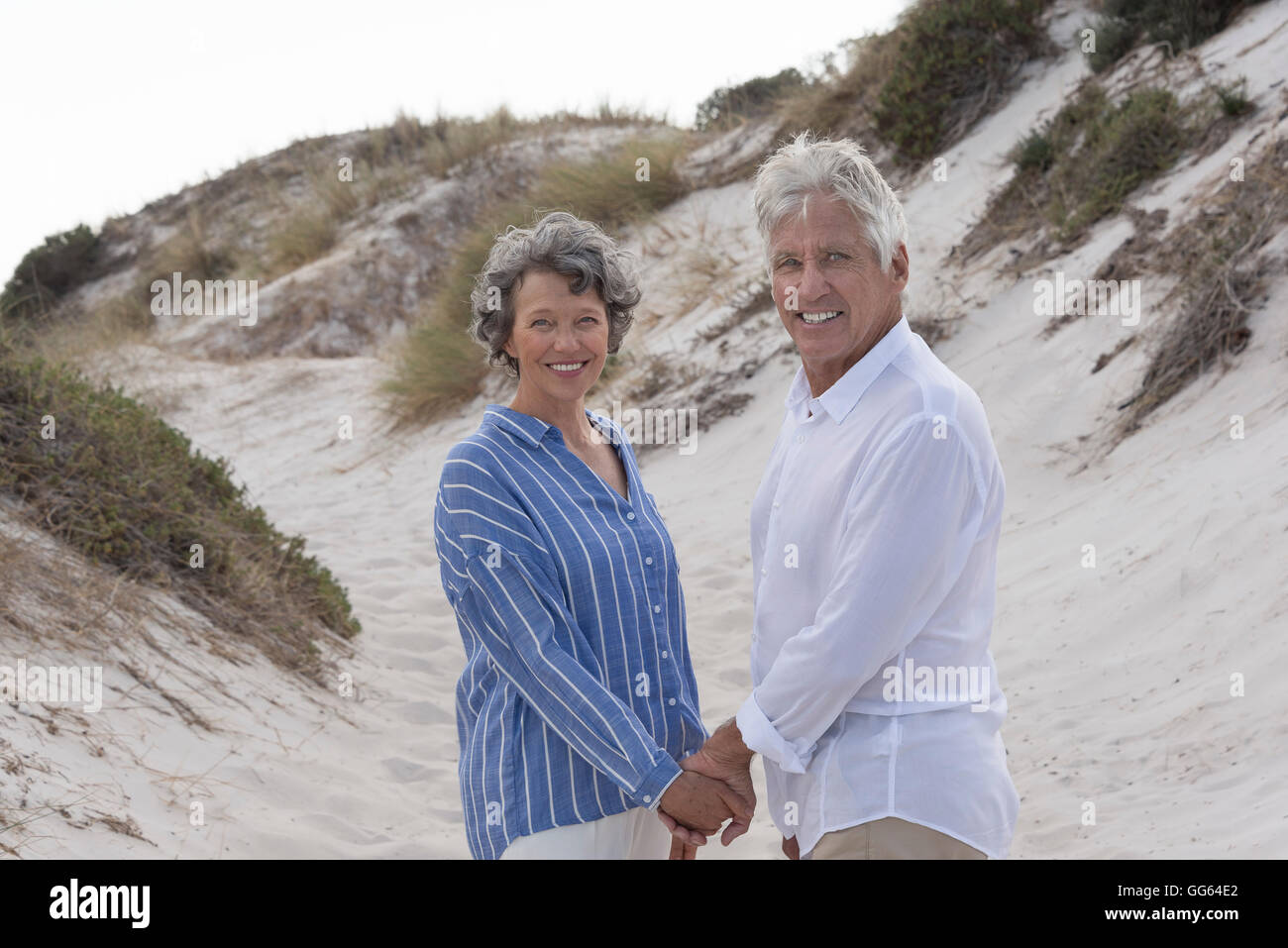 Senior couple standing outdoors hi-res stock photography and images - Alamy
