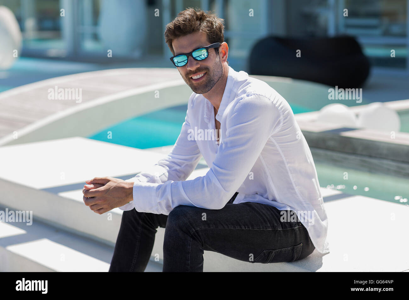 Close-up of an attractive mid adult man smiling Stock Photo - Alamy