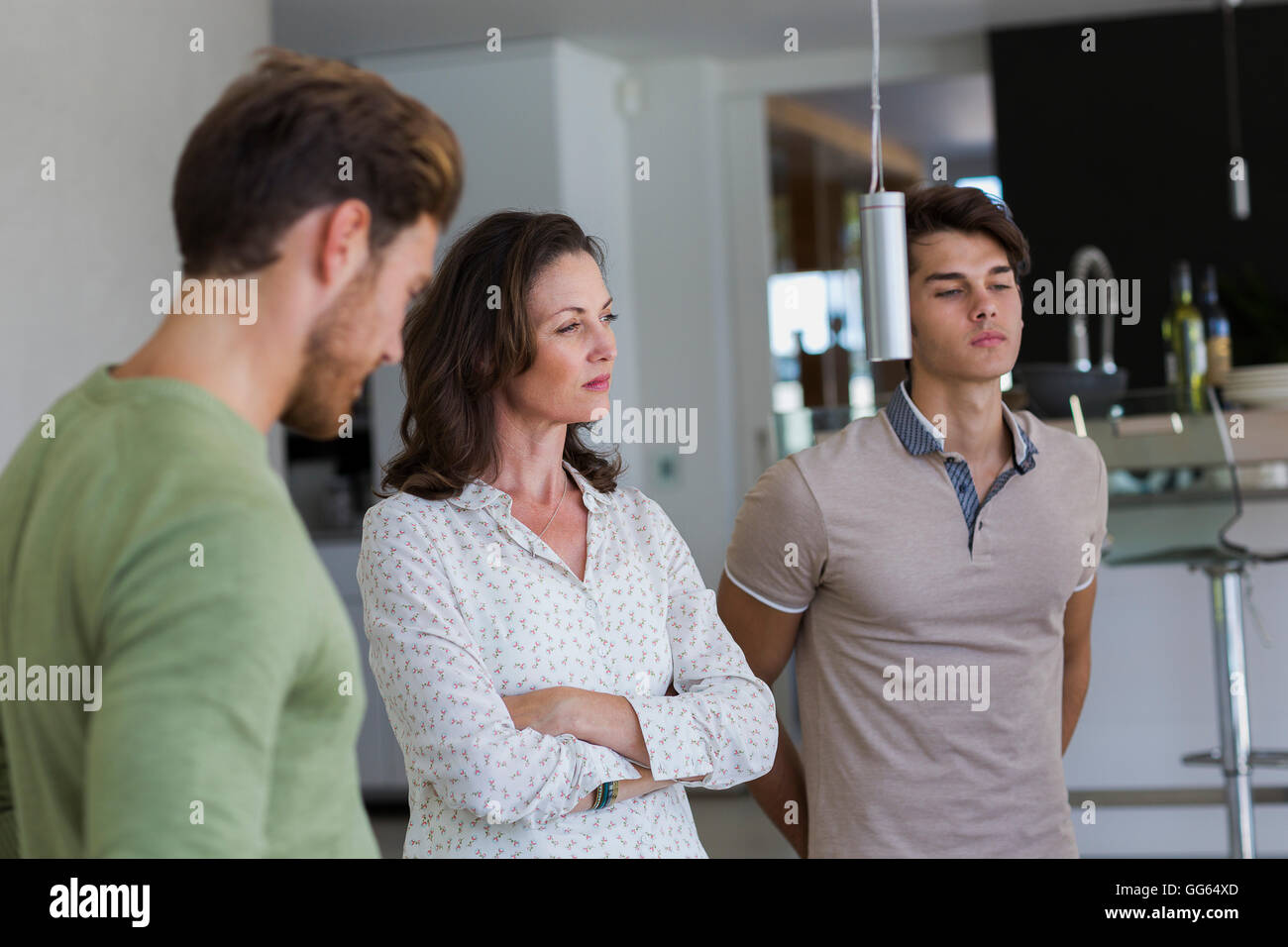 Close-up of three friends thinking Stock Photo - Alamy