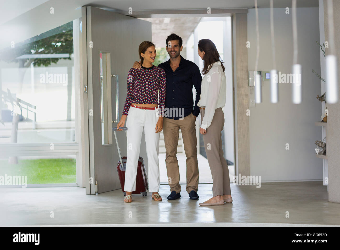 Welcoming friends home hi-res stock photography and images - Alamy